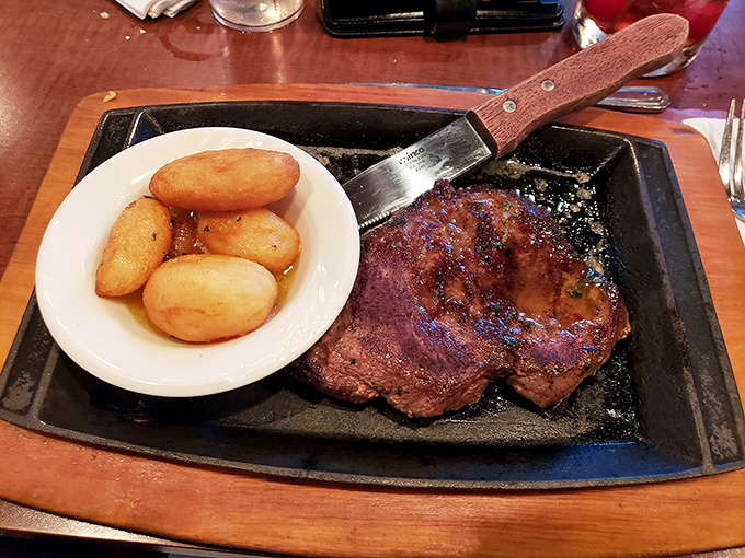 A steak that demands its own zip code. Those potatoes aren't just along for the ride&mdash;they're worthy companions on this flavor journey.