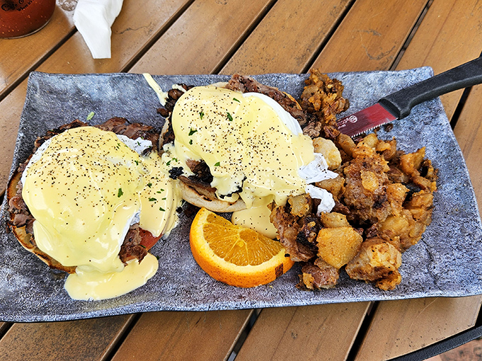 Benedict done right: perfectly poached eggs perched atop savory goodness with home fries that could make a potato farmer weep with pride.
