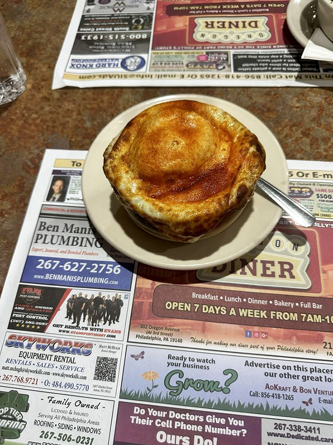 This French onion soup isn't just a dish&mdash;it's a commitment to excellence under a cathedral of perfectly browned cheese.
