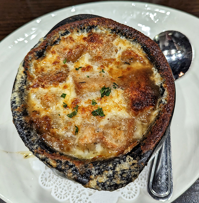 This isn't just French onion soup &ndash; it's a cheese-crowned miracle in a crock that would make Julia Child slow-clap in approval.