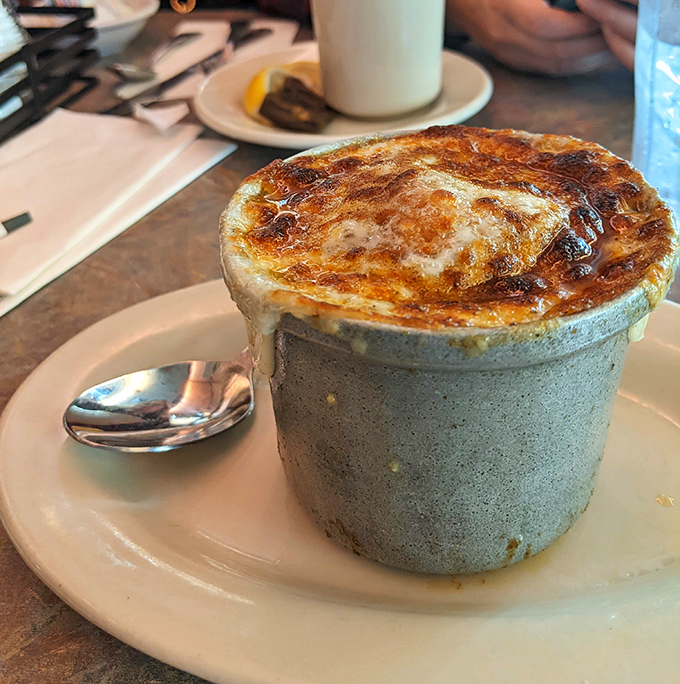 A French onion soup that could make a Parisian weep—that cheese pull deserves its own standing ovation.