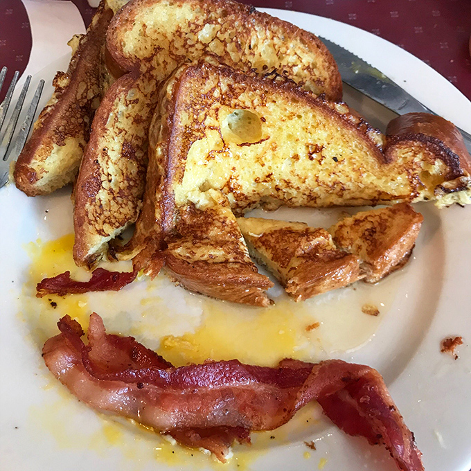 French toast that's achieved that mythical balance&mdash;crispy exterior, custardy interior. The bacon's just showing off at this point.