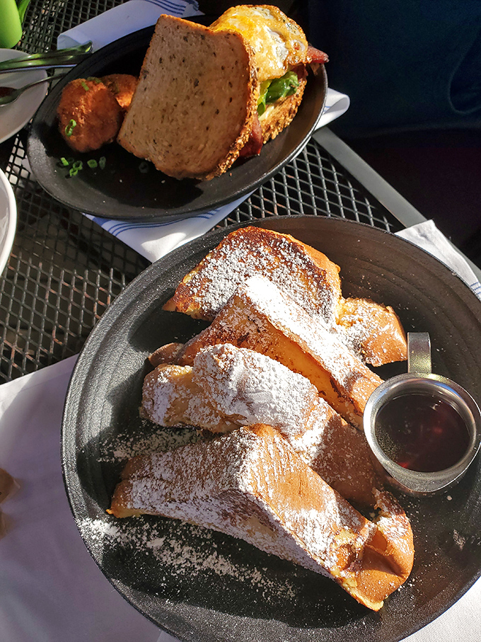 French toast that's dressed for success&mdash;powdered sugar dusted like fresh snow over golden bread that's crisp outside, custardy inside. Breakfast royalty.