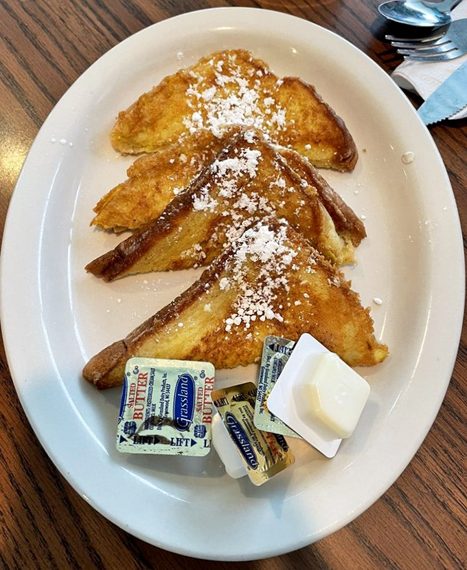 French toast dusted with powdered sugar like the first snow of winter. Add butter and syrup, and suddenly Monday morning doesn't seem so bad.