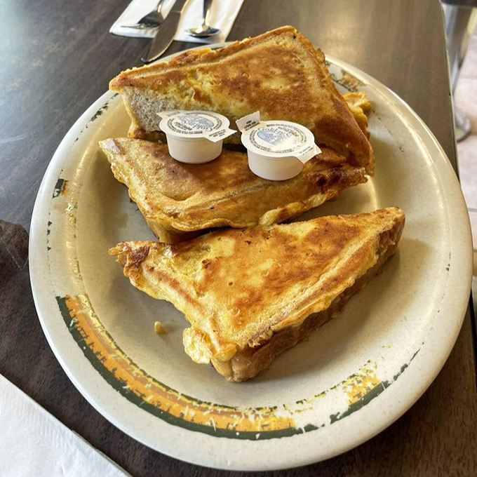 French toast that's achieved that mythical golden-brown perfection. The kind that makes you wonder if your grandmother has been secretly moonlighting here.