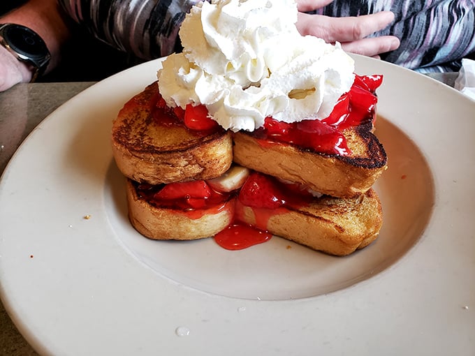 French toast that makes breakfast feel like dessert. Those strawberries and whipped cream aren't just toppings&mdash;they're a morning celebration.
