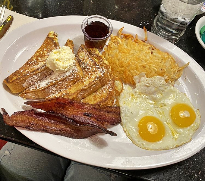 French toast that would make your grandmother both proud and jealous, paired with eggs sunny enough to brighten even Monday mornings.