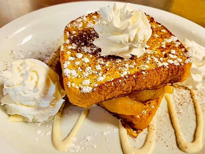 French toast that doesn't just participate in breakfast&mdash;it throws a parade complete with powdered sugar confetti and whipped cream floats.