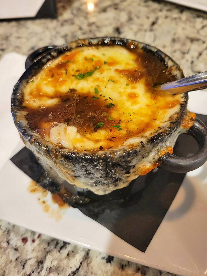 This isn't just French onion soup&mdash;it's a bubbling cauldron of cheese-capped comfort that would make Julia Child weep with joy.