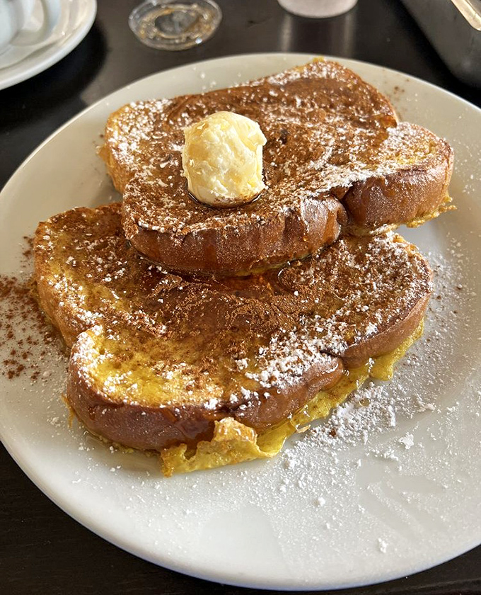 French toast that's achieved celebrity status in my breakfast fantasies&mdash;custardy interior, crisp edges, and that perfect butter crown.