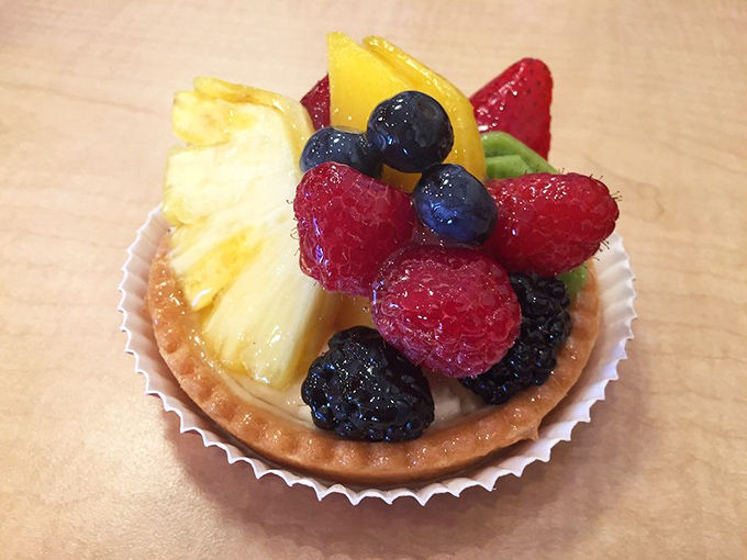 This fresh fruit tart looks like summer decided to throw a colorful party on pastry.