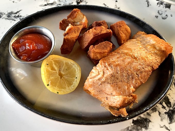 Golden-crusted salmon with crispy potatoes proves The Top isn't just a one-trick pony&mdash;they respect the sea as much as the pasture.