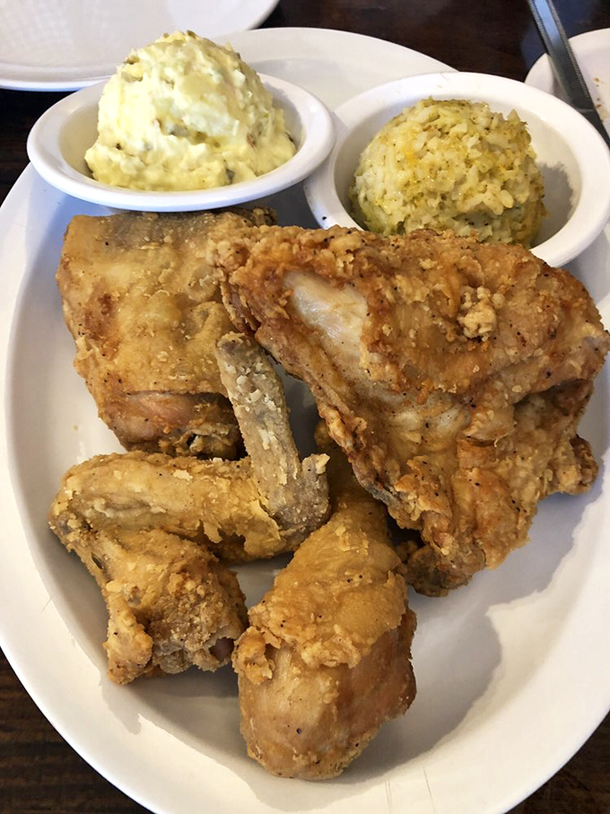 Fried chicken so perfectly golden it deserves its own trophy. The crunch heard 'round the restaurant announces your first heavenly bite. 