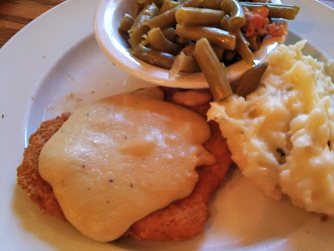 Comfort food elevated: this chicken cutlet with creamy sauce proves that sometimes the simplest dishes create the strongest memories.