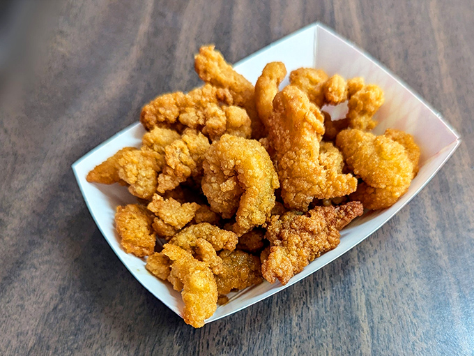 These golden nuggets of fried clam goodness look like they're auditioning for a seafood hall of fame. Crispy outside, briny-sweet inside.