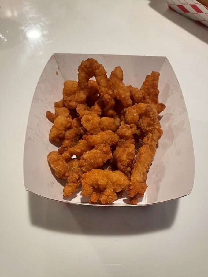 These golden nuggets of fried clam goodness could make Neptune himself jealous. Crunchy outside, tender within—the ocean's candy in every bite.