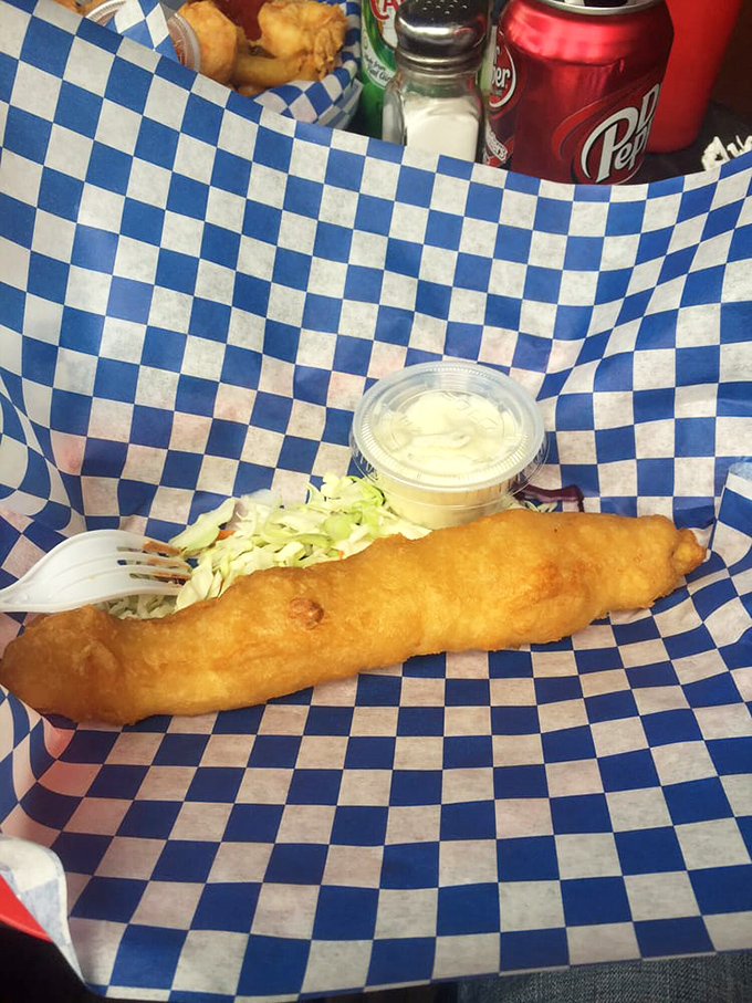 This isn't just fried fish&mdash;it's a masterclass in batter architecture, creating that perfect crunch before revealing the tender white fish beneath.