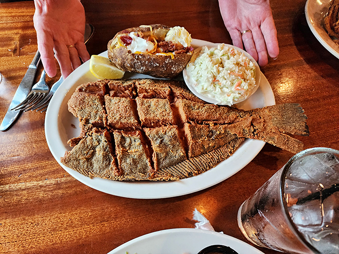 Fried flounder that's scored and crispy, served with the kind of sides that make you wonder why you don't eat like this every day.