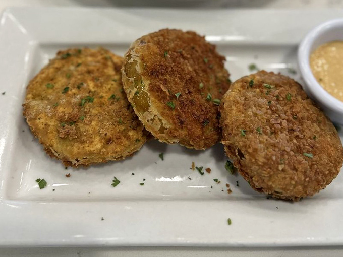 These golden discs aren't your grandmother's fried green tomatoes, unless your grandmother was secretly a culinary genius.