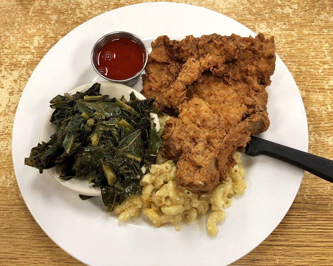 Soul-satisfying fried chicken with collards and mac and cheese. This plate has more Southern credentials than a Tennessee Williams play.
