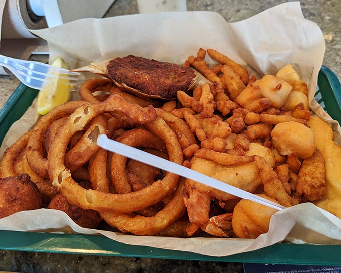 The golden treasure chest of the sea. This fried seafood platter is what happens when Neptune decides to throw a party.