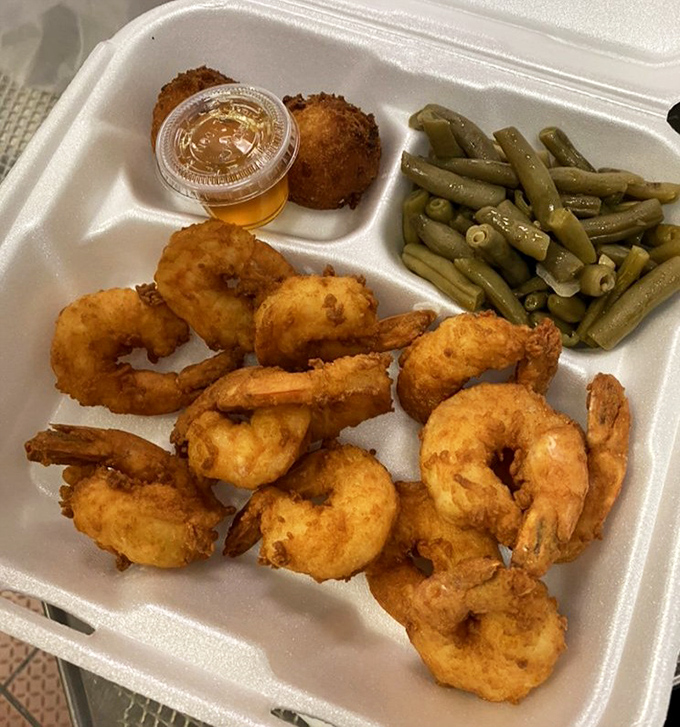 Golden-fried shrimp that snap with each bite. Paired with green beans and a hushpuppy, it's a Southern seafood trifecta.
