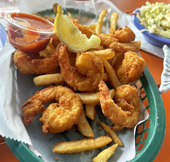 These fried shrimp could make a vegetarian reconsider their life choices &ndash; golden perfection with a side of coleslaw diplomacy.