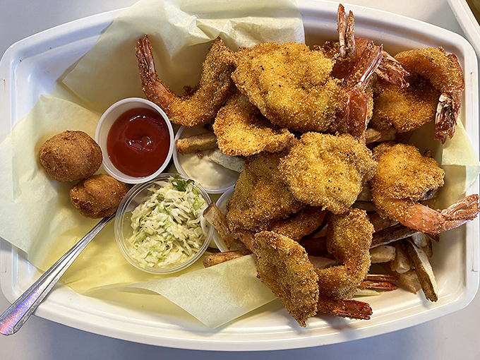 These cornmeal-crusted shrimp aren't just fried&mdash;they're transformed into crispy vessels of seafood perfection. The hushpuppy is just showing off.