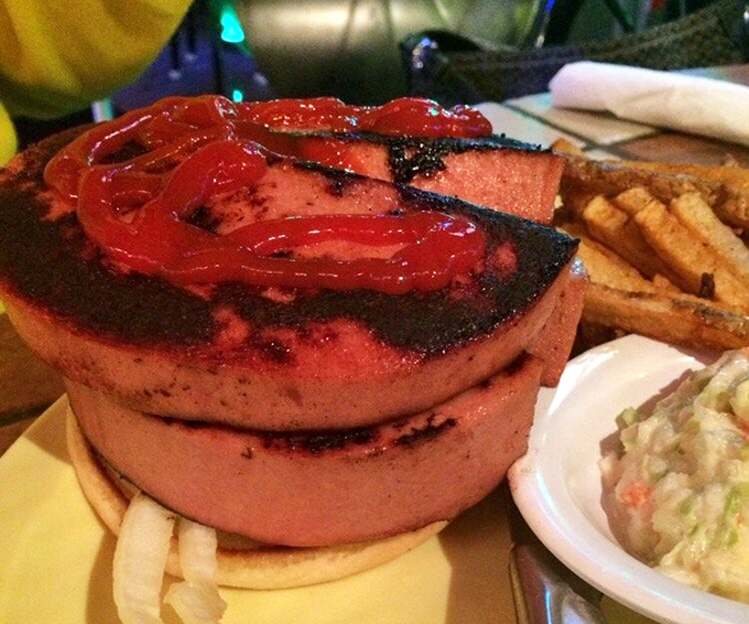 This isn't your childhood bologna sandwich. Thick-cut, perfectly grilled, and topped with vibrant red tomatoes &ndash; lunch box nostalgia transformed into culinary delight.