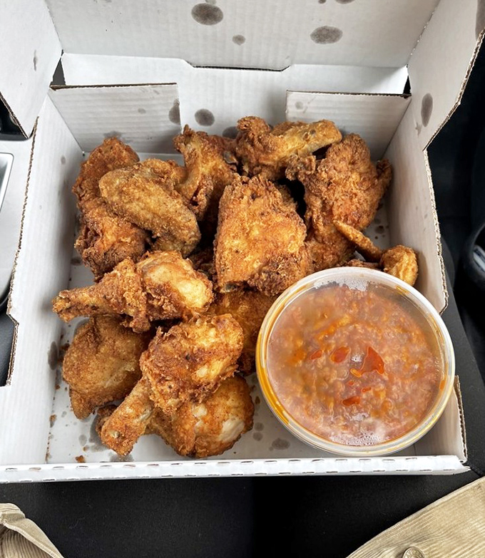 Golden fried chicken that proves comfort food doesn't need fancy plating to achieve absolute deliciousness and satisfaction.