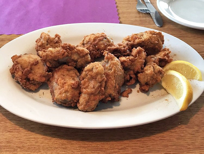 These golden-fried oysters have that perfect crispy-outside-juicy-inside magic that makes you close your eyes and momentarily forget your table manners.