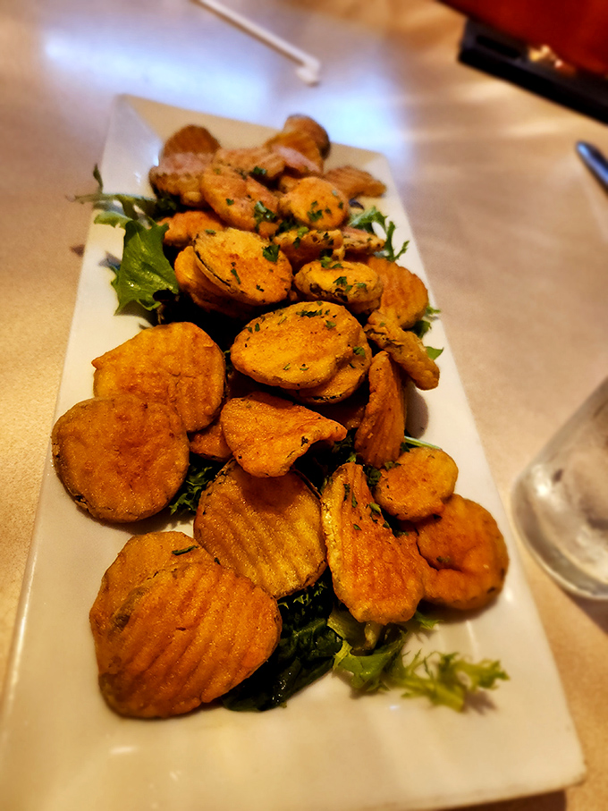 These golden fried pickles aren't just appetizers&mdash;they're little discs of joy that make waiting for your main course a pleasure, not a chore.