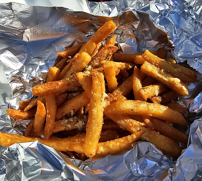 Golden, crispy, and glistening with seasoning, these fries aren't just a side dish&mdash;they're the supporting actor that steals every scene.