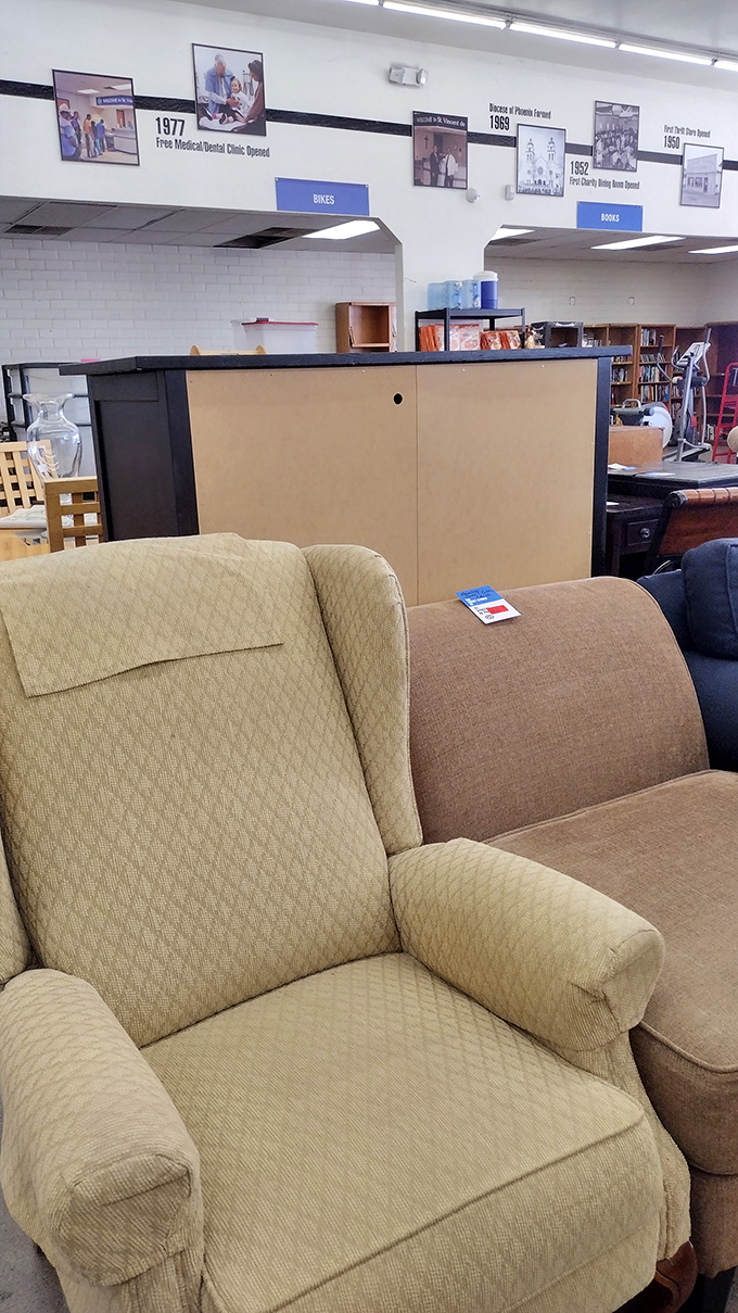 The furniture section tells stories of living rooms past. That beige recliner has seen thousands of TV shows and is ready for thousands more.