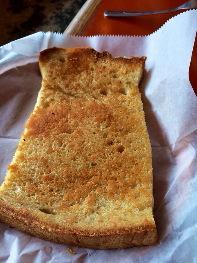 Garlic bread so buttery and golden, it deserves its own California zip code. The perfect sauce-sopping companion.