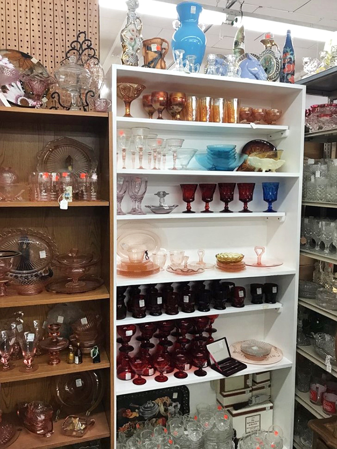 Depression glass heaven! These rosy goblets and azure plates once graced tables during FDR's fireside chats—now ready for your Sunday dinners.