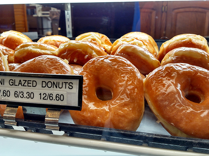 These glazed donuts aren't just breakfast &ndash; they're edible sunshine. One bite and you'll understand why people drive for hours just to grab a dozen.