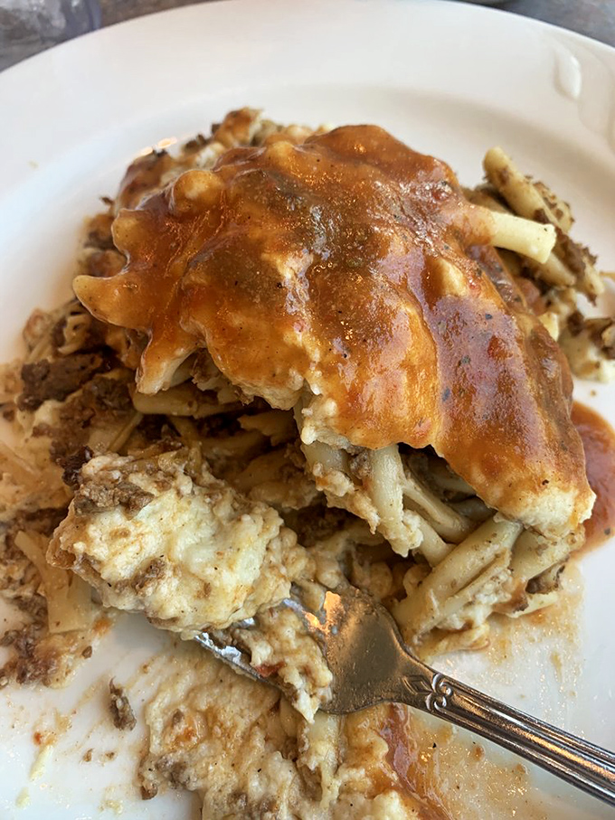 Comfort food architecture at its finest&mdash;layers of pasta, meat, and cheese under a blanket of sauce that says "today's diet starts tomorrow."