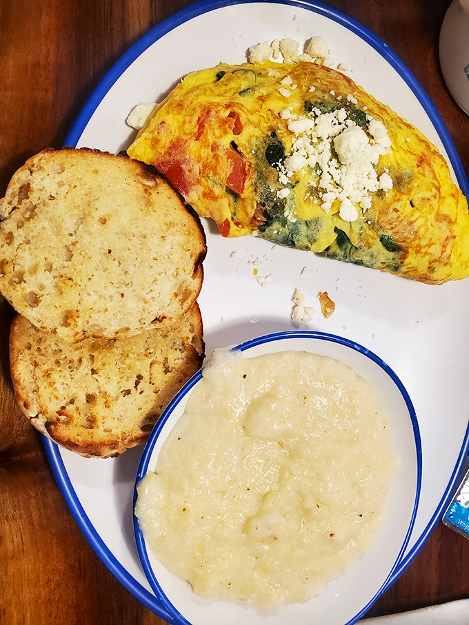 This Greek omelet with creamy grits and English muffin is the breakfast equivalent of hitting all green lights on your morning commute—everything's going your way.