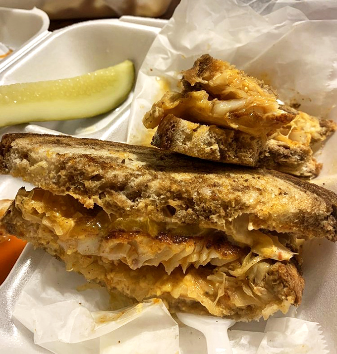 The legendary Grouper Reuben in all its glory&mdash;where fish meets sauerkraut in a marriage that somehow makes perfect sense.