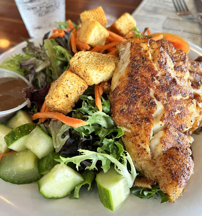 Grouper done Dixie style &ndash; swimming in garlic butter and looking like golden sunshine on a plate.