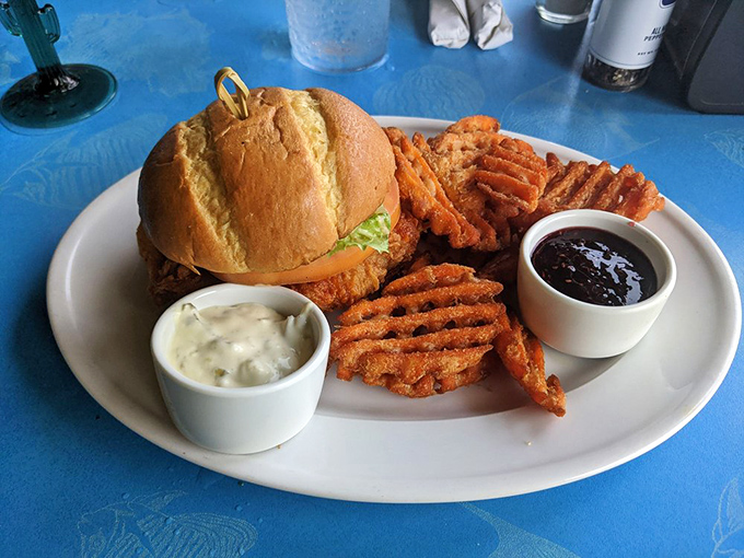 This isn't just a sandwich&mdash;it's Florida architecture: sturdy foundation, perfect construction, and topped with something orange that makes everyone happy.