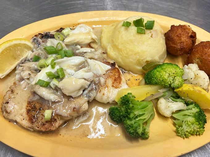 Grouper topped with crab and served alongside fresh vegetables isn't just a meal&mdash;it's the reason stretchy pants were invented.