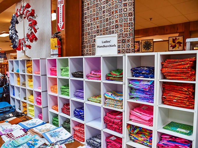 A rainbow of handkerchiefs organized with such precision, Marie Kondo would weep with joy at the colorful display.