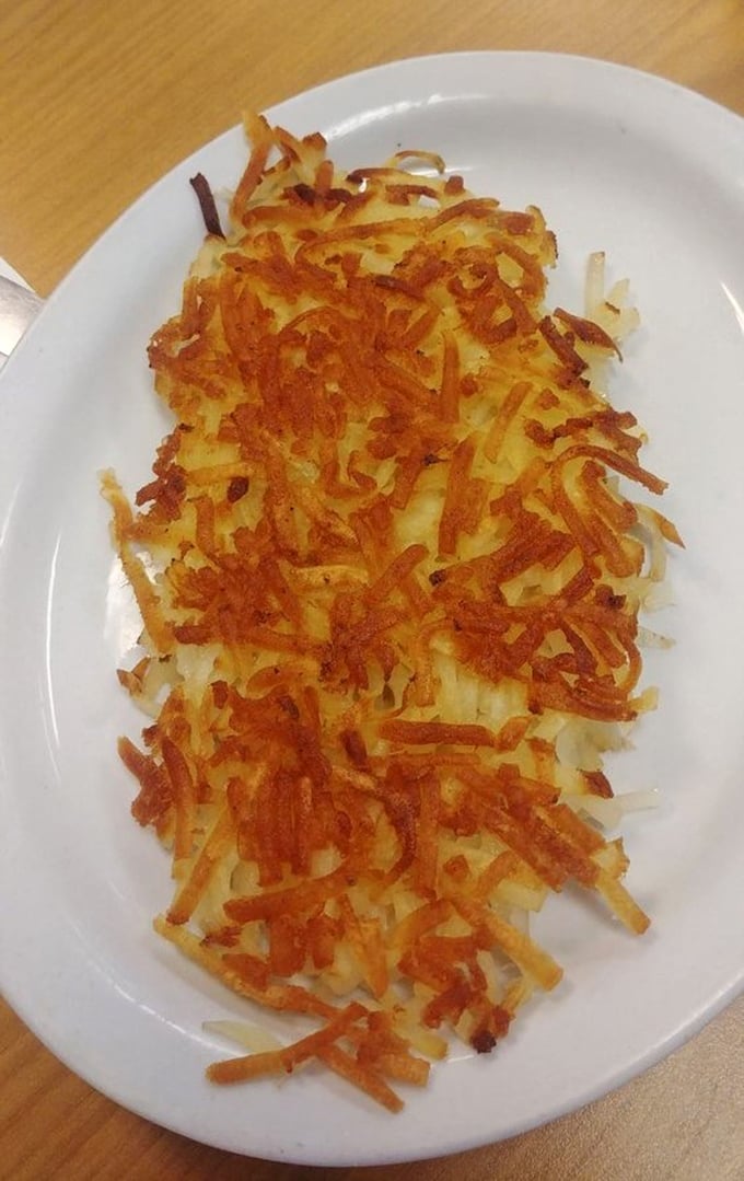 These hash browns achieve the golden-brown perfection that home cooks spend decades trying to master.