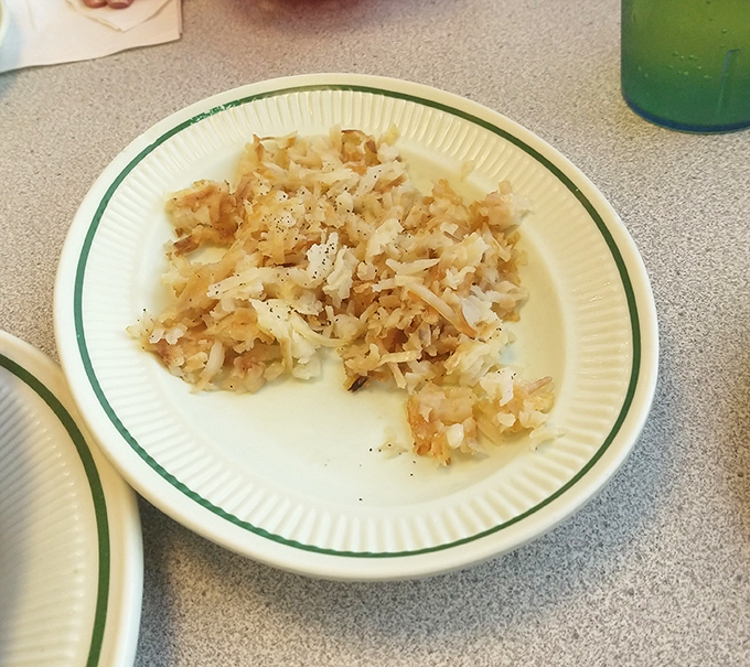 These aren't your average hash browns; they're crispy potato confetti celebrating your excellent life choices this morning.