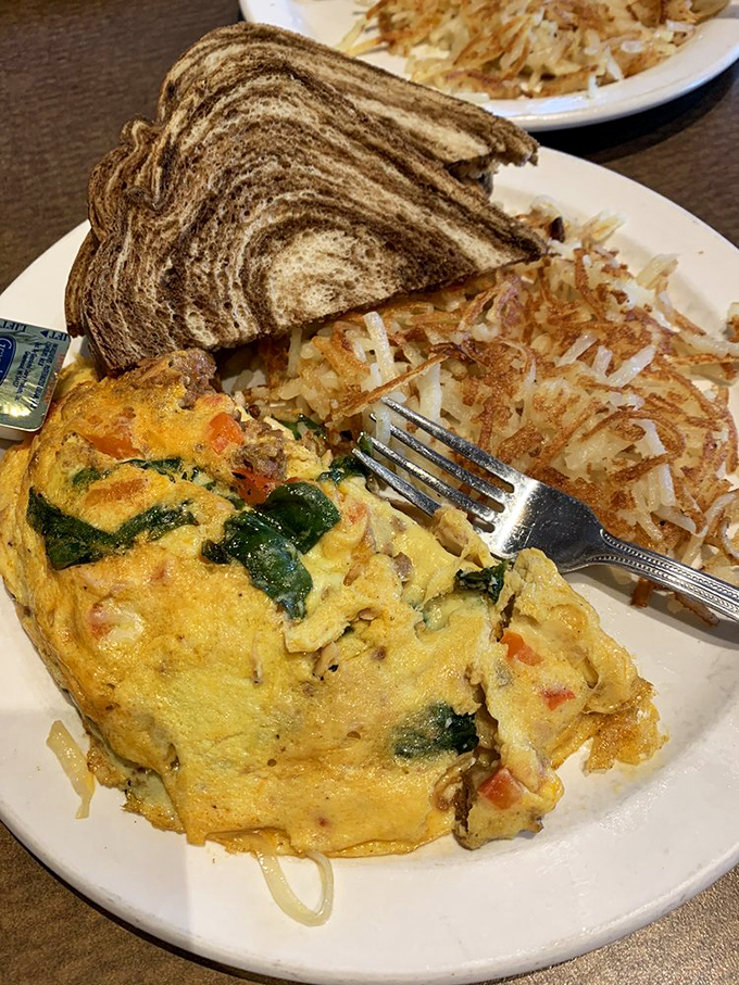 A beautiful marriage of eggs, marble rye toast, and perfectly crispy hash browns—the breakfast trinity that makes getting out of bed worthwhile.