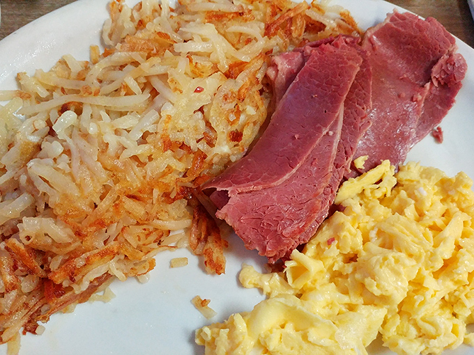 Breakfast nirvana: crispy hash browns, tender corned beef, and fluffy scrambled eggs&mdash;the holy trinity of morning meals that'll fuel you through anything Detroit throws your way.