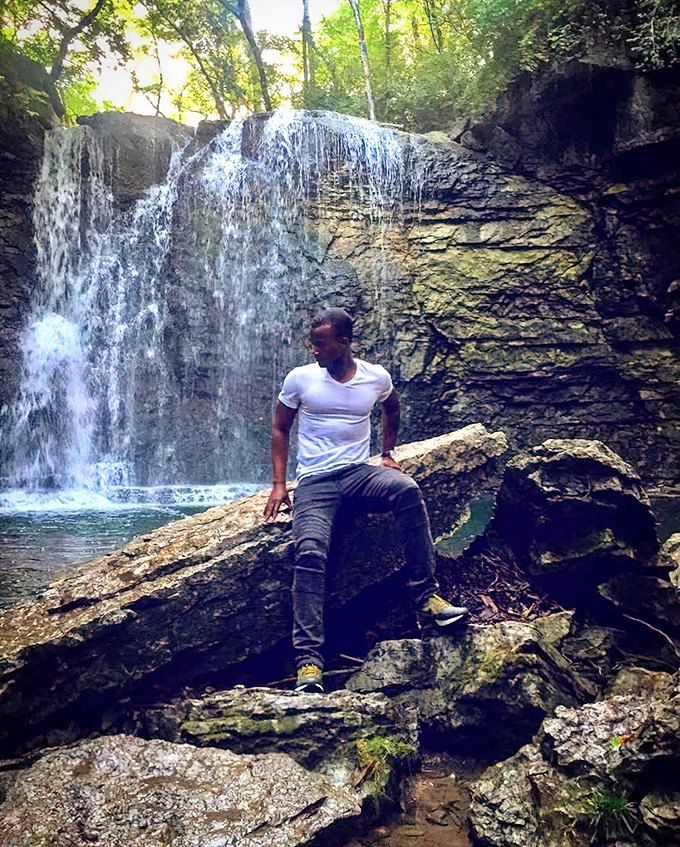 Finding your moment of zen beside rushing water. This peaceful spot offers the perfect perch for contemplation&mdash;nature's version of a meditation app.
