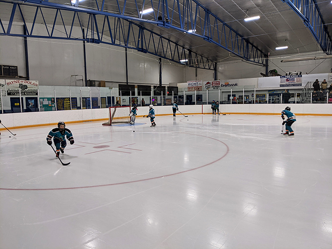 Future hockey stars chase pucks across Escanaba's indoor rink, where winter sports aren't just activities &ndash; they're practically religion in the U.P.